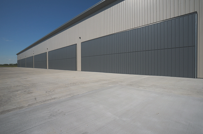 Bifold Doors for Aircraft Hangar Condominium | Diamond Doors